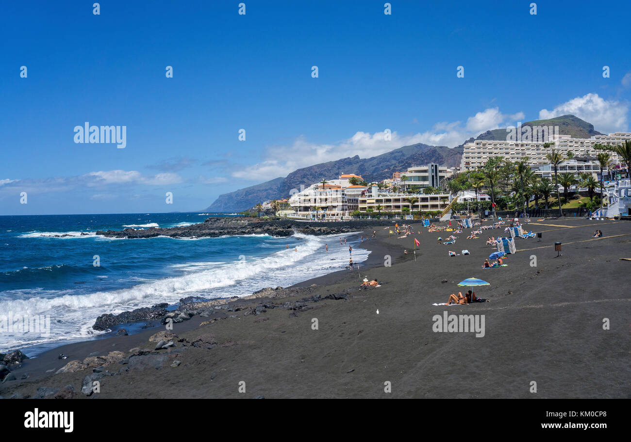 Playa La Arena, dark beach at the village La Arena, west coast ...