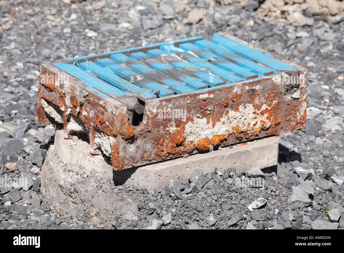 blue old rusty manhole cover Stock Photo - Alamy