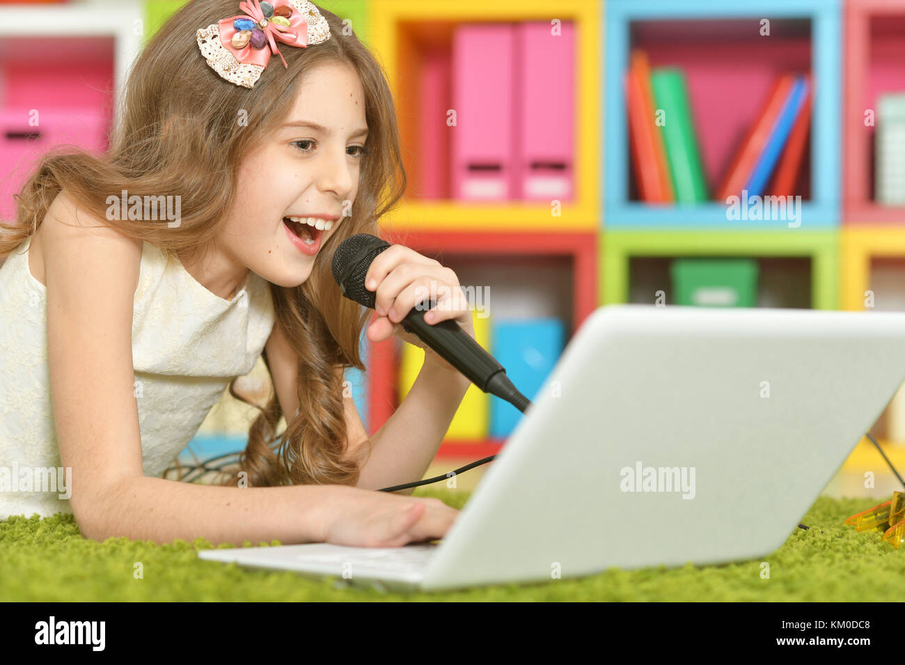 girl singing karaoke Stock Photo - Alamy