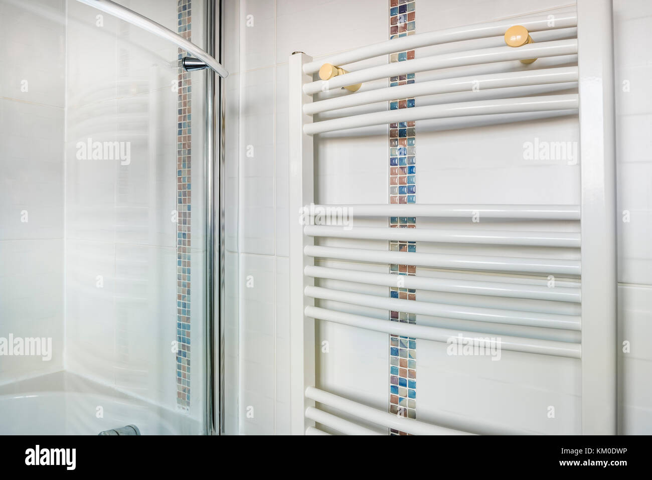 Heated white towel rail Stock Photo - Alamy