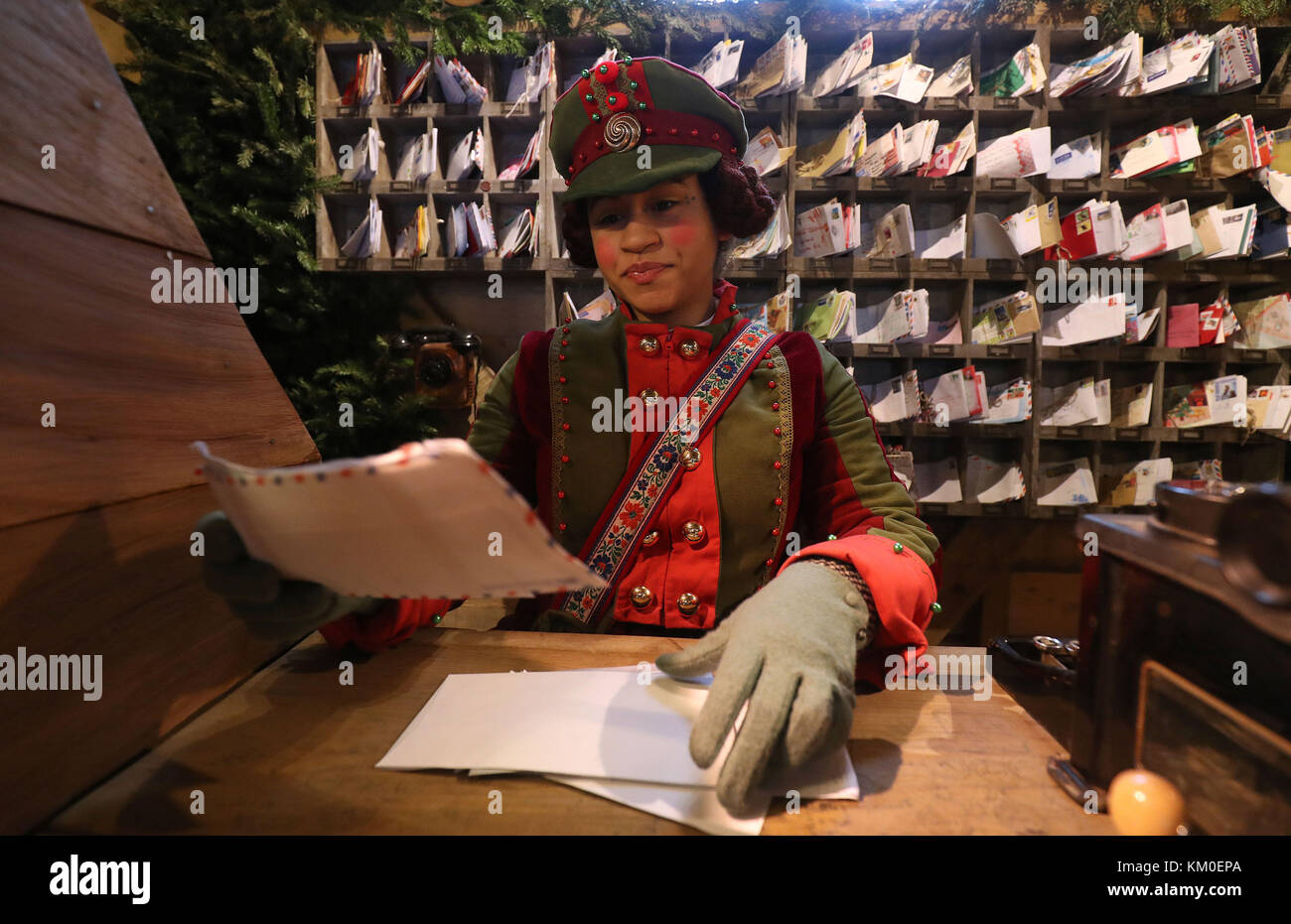 Elf Post Mistress Elva sorts post in the Elf Post Office at the 'Arctic ...