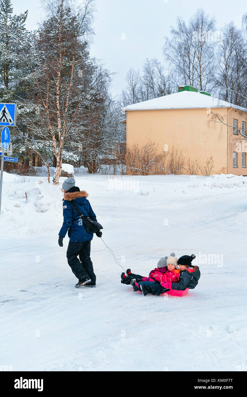 Rovaniemi, Finland - March 2, 2017: Mother with her children on ...
