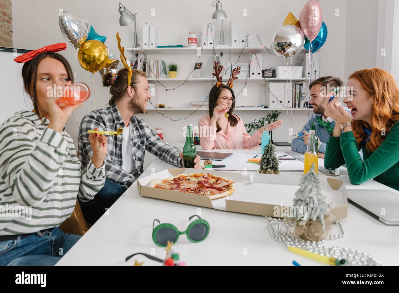 Partying at the office Stock Photo - Alamy