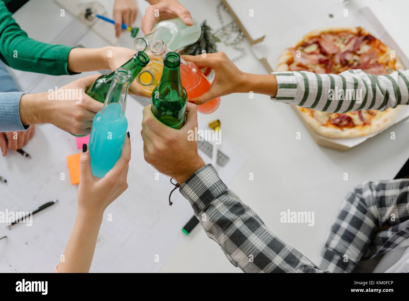 Cheers for another year at the office Stock Photo - Alamy