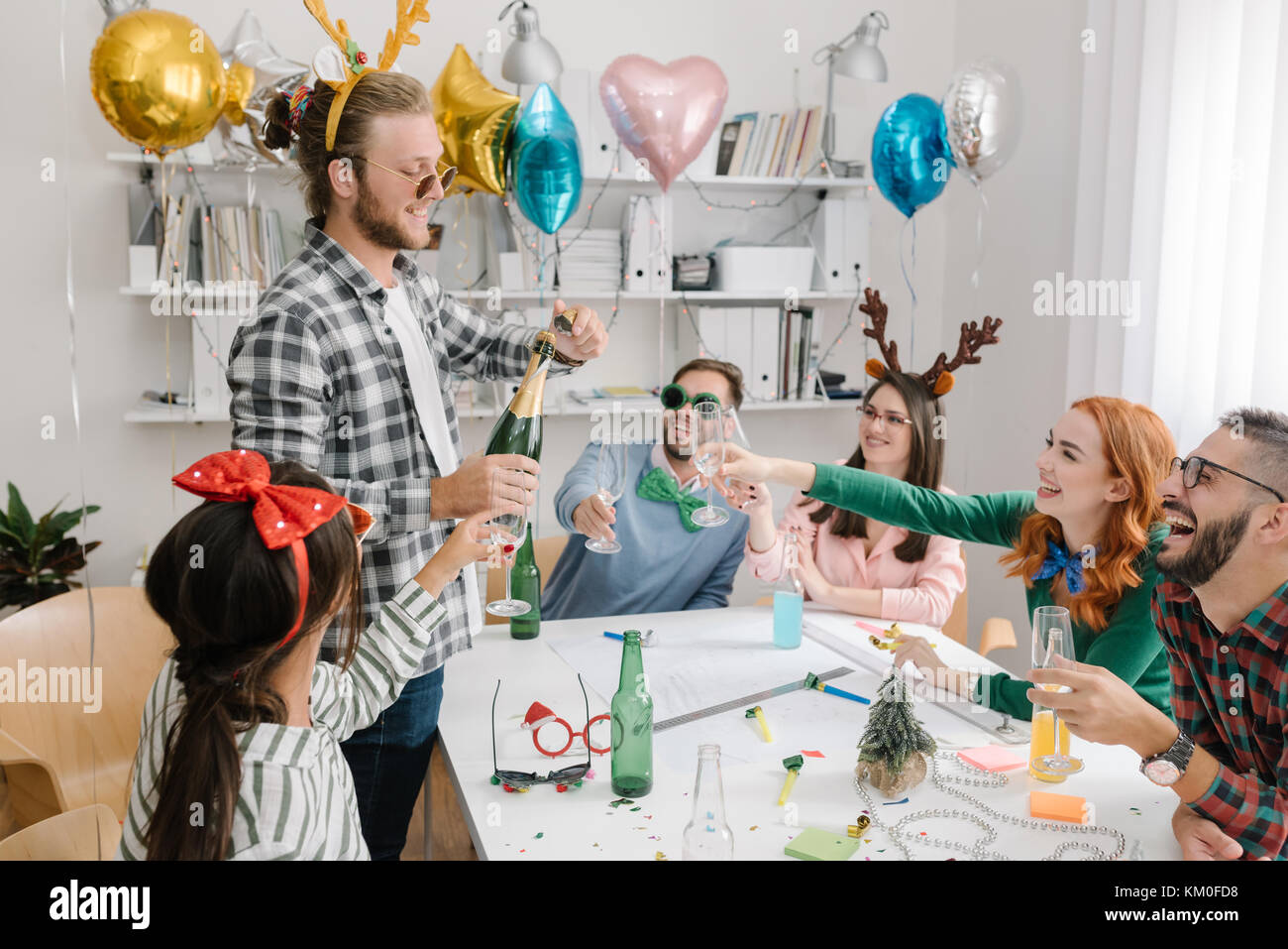 Celebrating office opening colleagues hi-res stock photography and ...