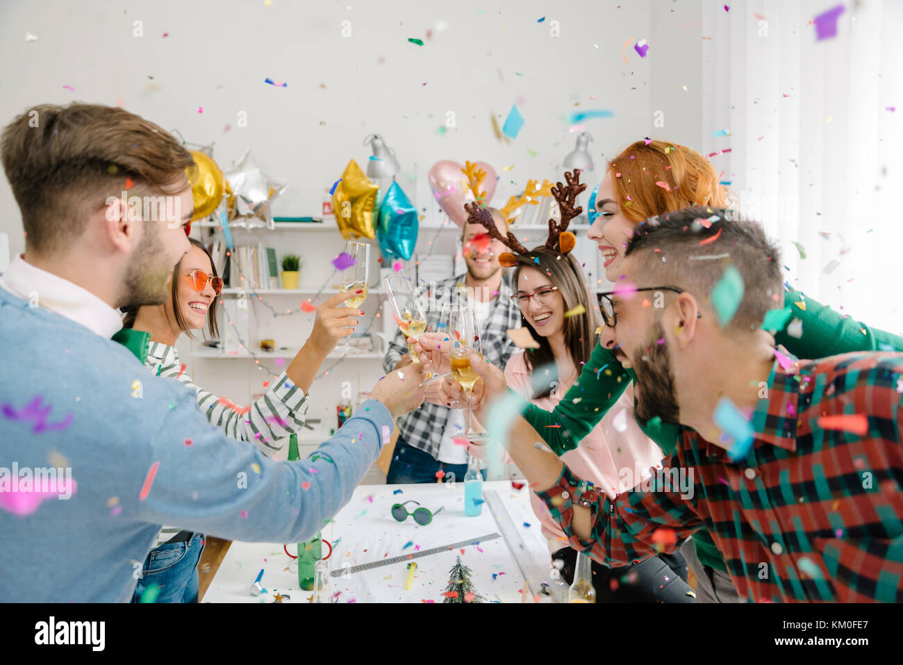 Raining confetti at office party Stock Photo - Alamy
