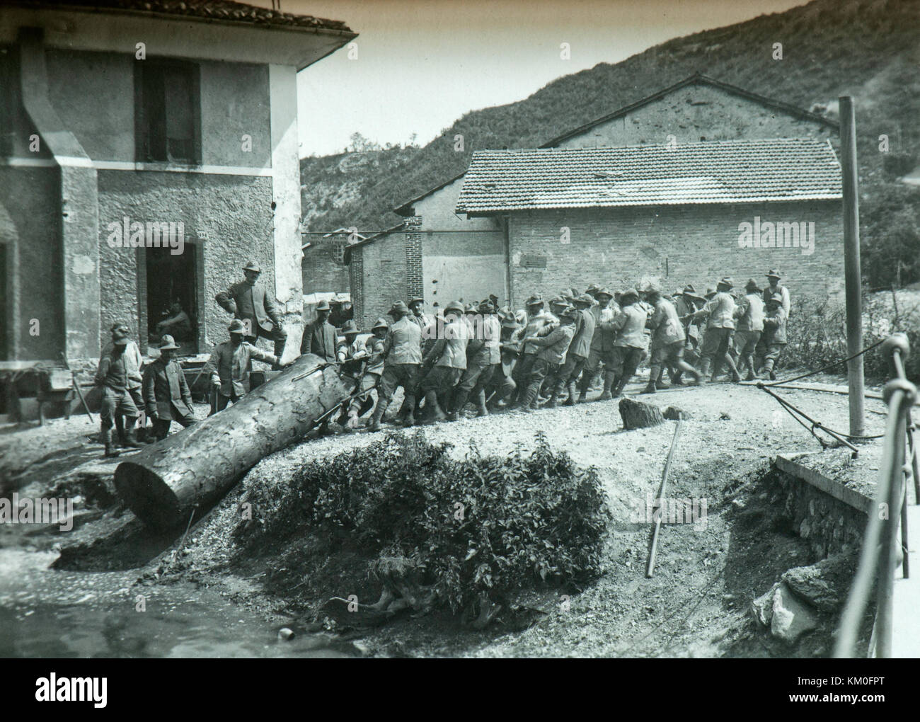 A regiment of Italian Alpini pull a havi log during WWII (1940s Stock ...