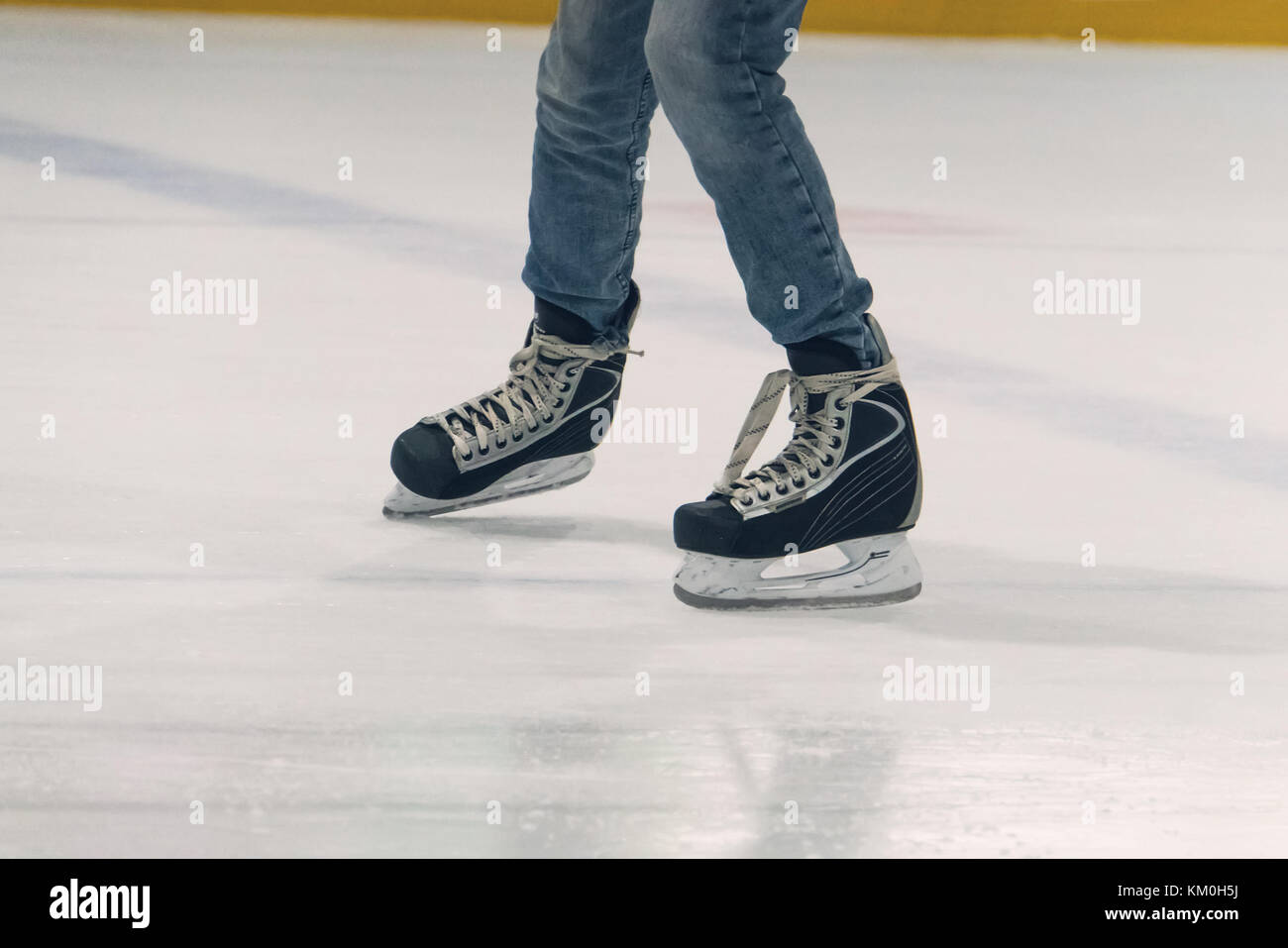 Legs in skates on ice hi-res stock photography and images - Alamy