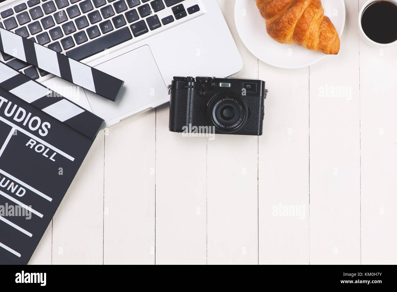 Film director desk with movie clapper board. Top view Stock Photo - Alamy