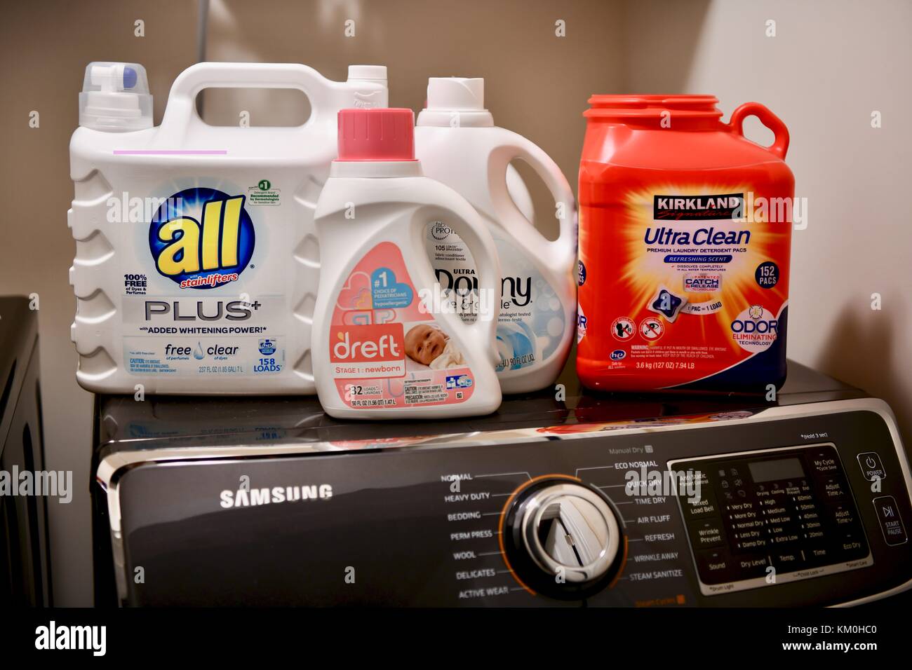 Laundry detergent and fabric softener laundry supplies Stock Photo - Alamy