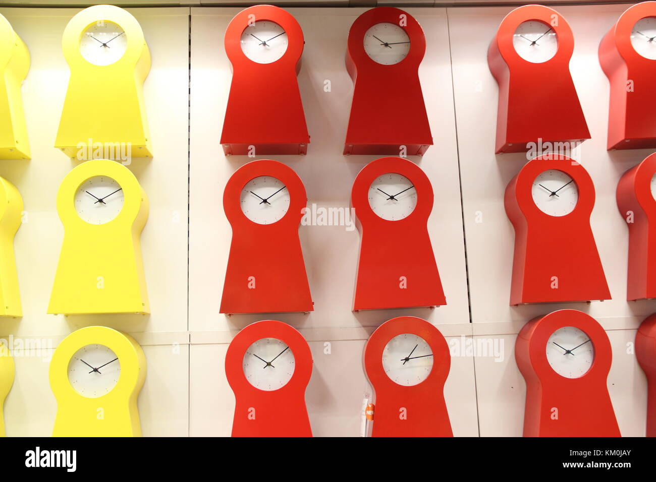 Clocks on a wall Stock Photo - Alamy