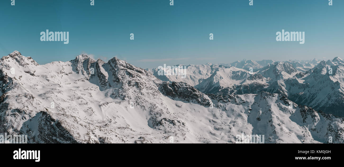 Panorama of alpine landscape covered in snow Stock Photo - Alamy