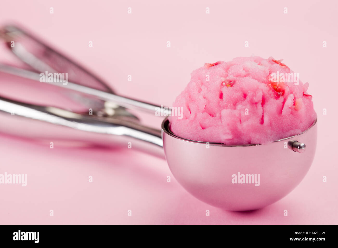 photo of strawberry ice cream inside ice creram scoop Stock Photo - Alamy
