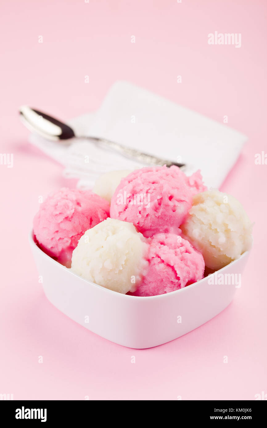 photo of fresh strawberry vanilla ice cream on a rose background Stock ...