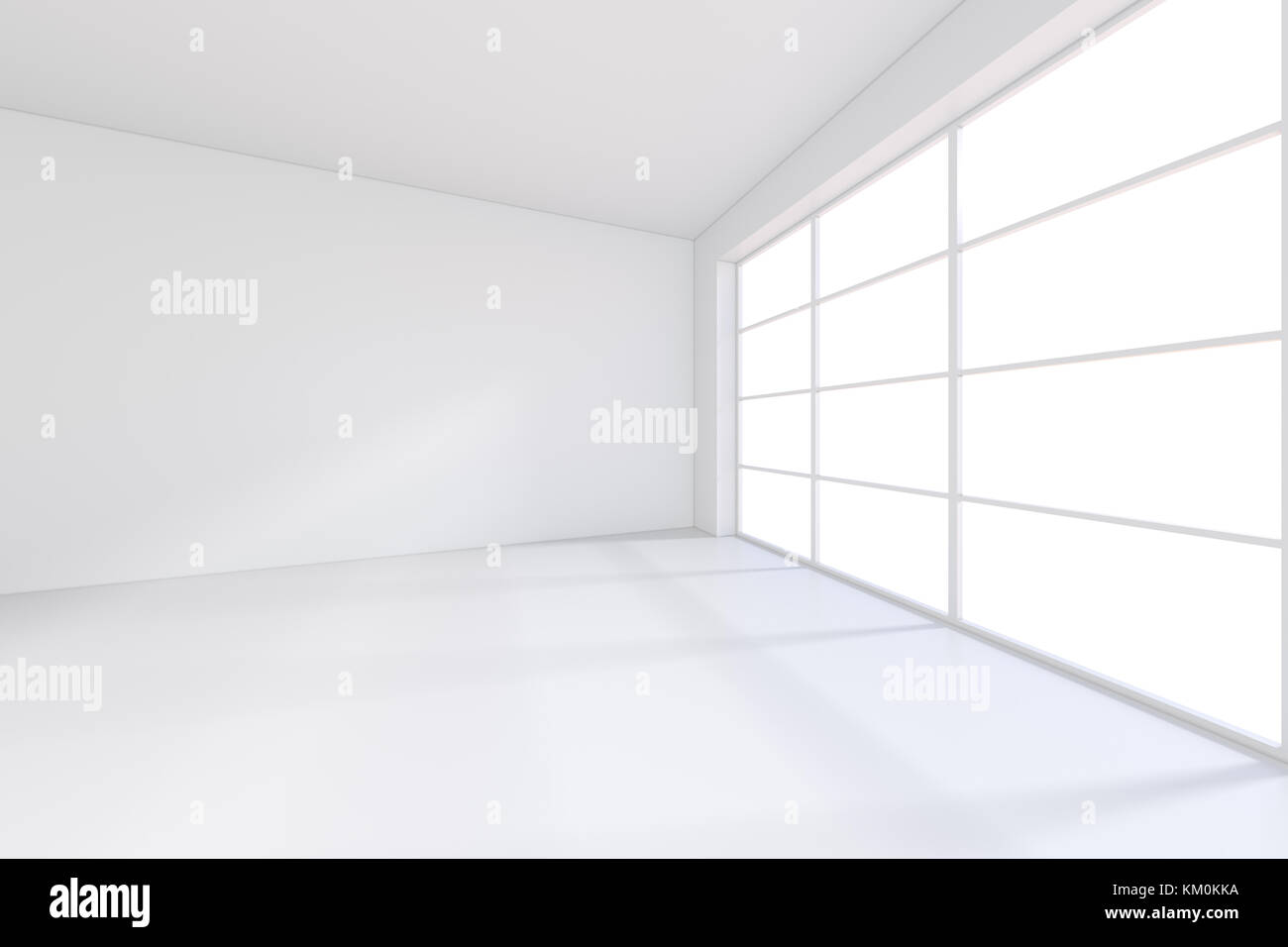 Large room with windows and falling light from the window on the wall ...