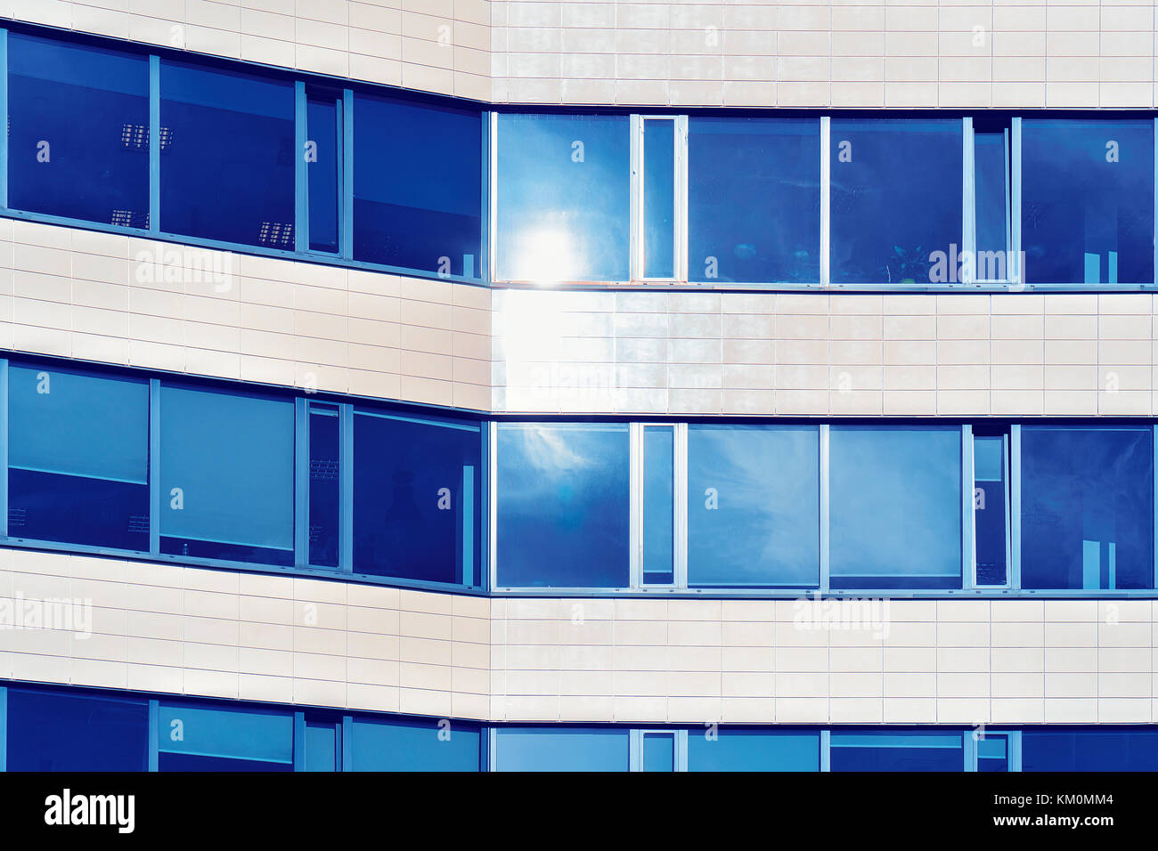 Windows of the modern office skyscraper in the business district Stock ...
