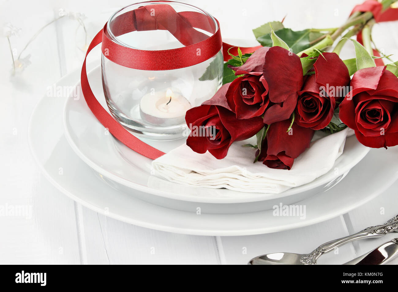 Romantic table setting rose petals hi-res stock photography and images ...