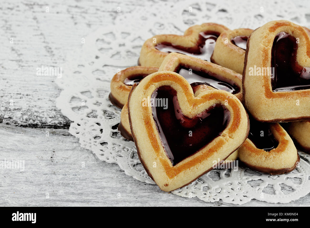 Heart shaped shortbread cookies in a circle on a rustic background ...