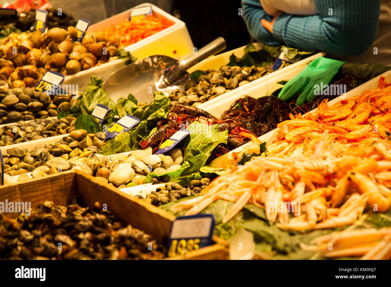 Various shellfish and seafood on display at La Boqueria market in ...
