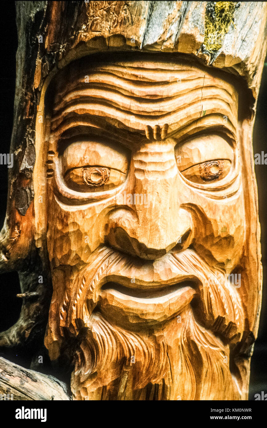 Wood carving of face Stock Photo - Alamy