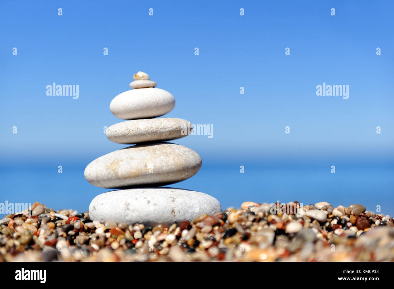 Stack of pebble stones at the beach Stock Photo - Alamy