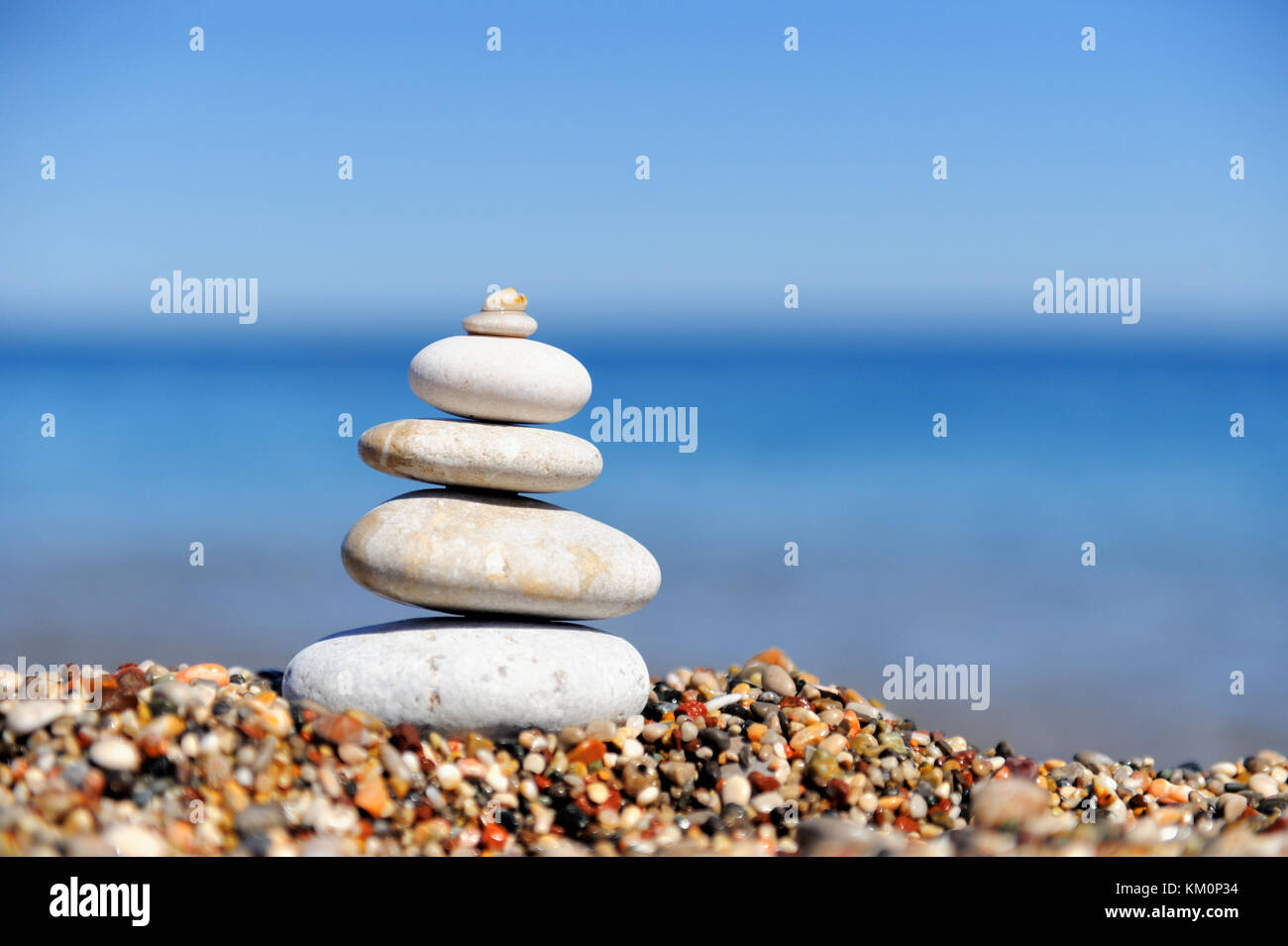 Stack of pebble stones at the beach Stock Photo - Alamy