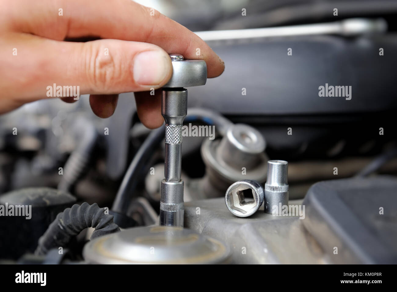 Hands of car mechanic in auto repair service Stock Photo - Alamy