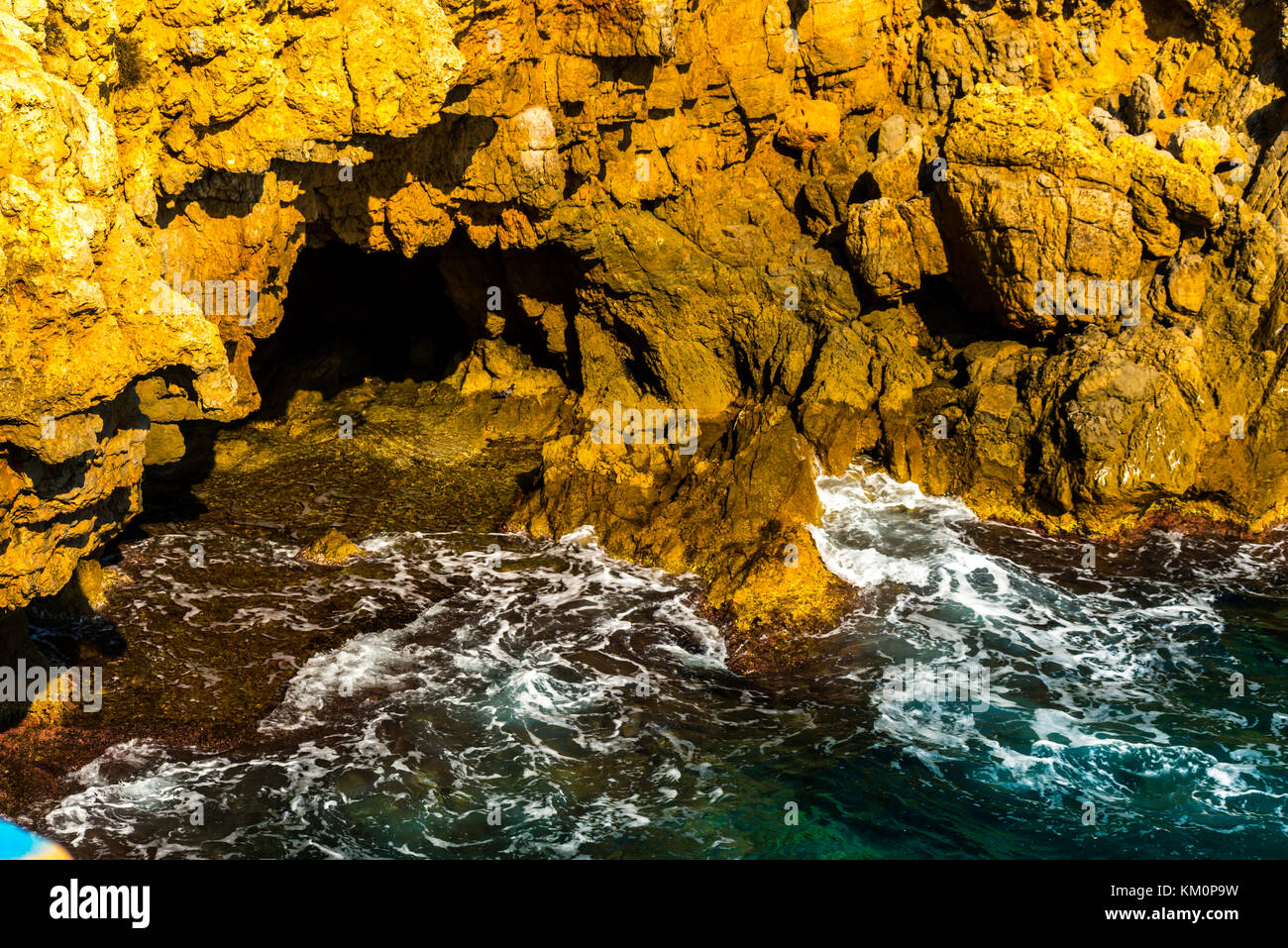 high cliff above the sea, summer sea background, many splashing waves ...