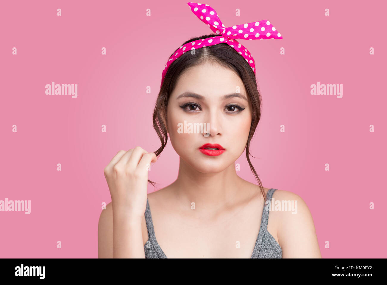 Beautiful woman pinup style portrait. Asian woman Stock Photo - Alamy