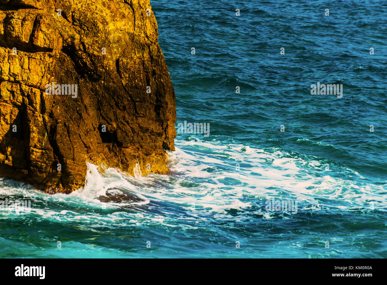 high cliff above the sea, summer sea background, many splashing waves ...