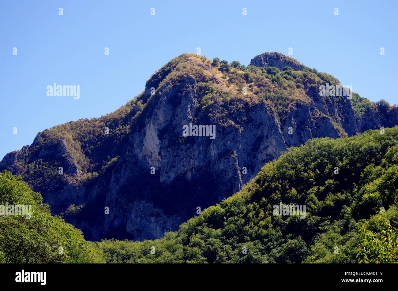 mountain top without trees where you can see the stone carved by the ...