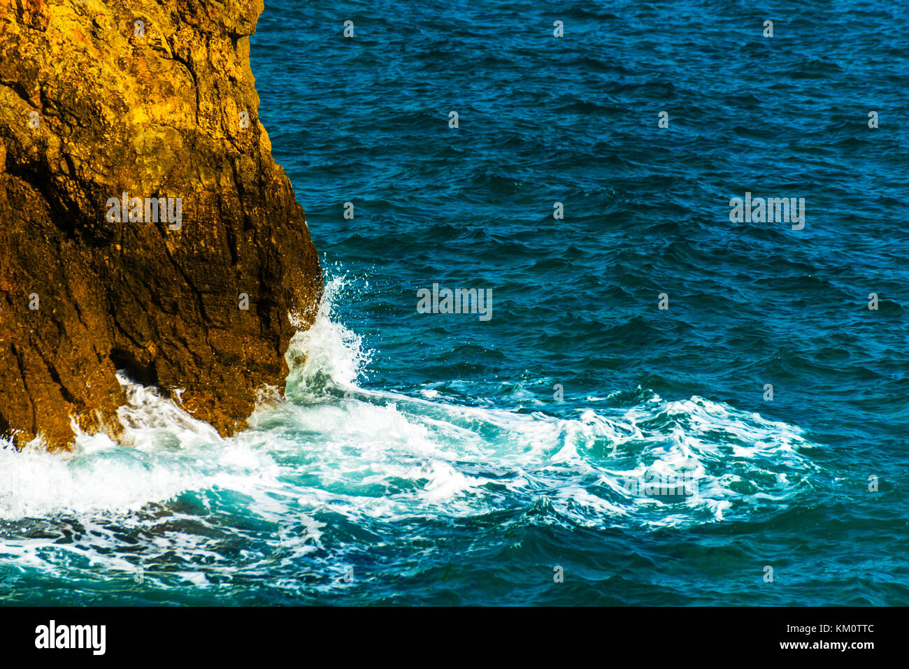 high cliff above the sea, summer sea background, many splashing waves ...