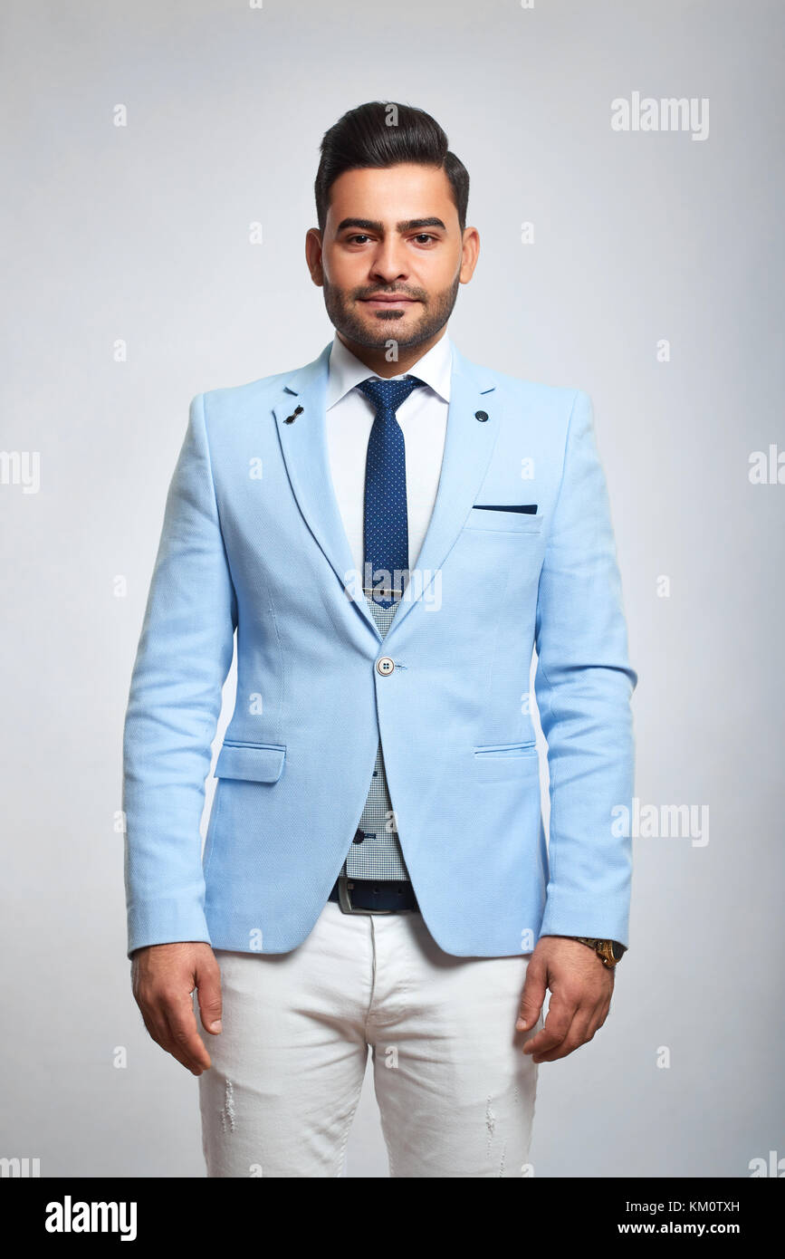 Stylish businessman at studio Stock Photo - Alamy
