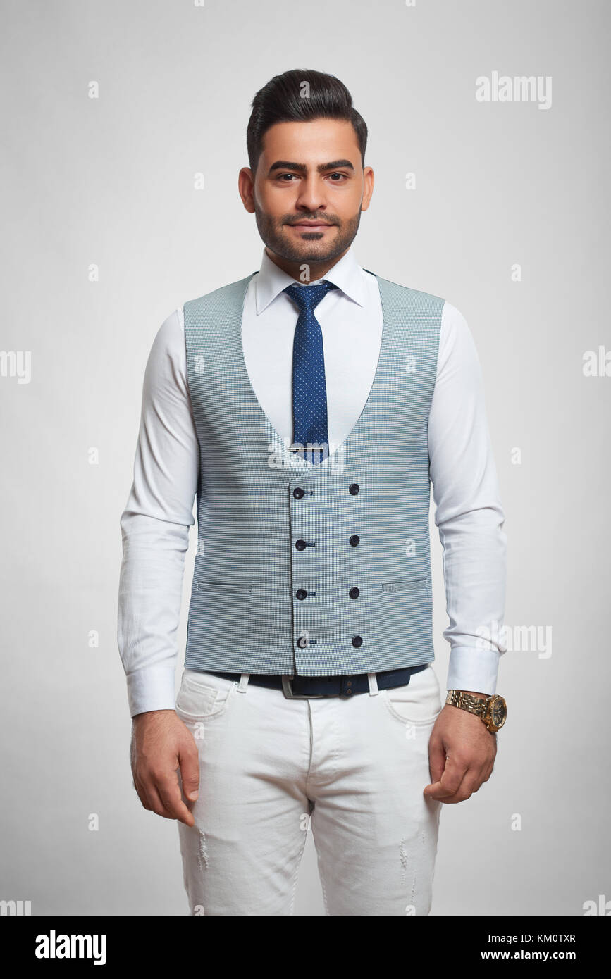 Stylish businessman at studio Stock Photo - Alamy