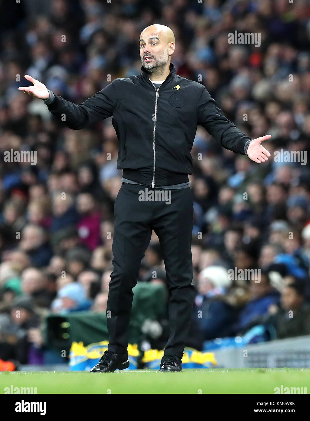 Manchester City manager Pep Guardiola gestures on the touchline during ...