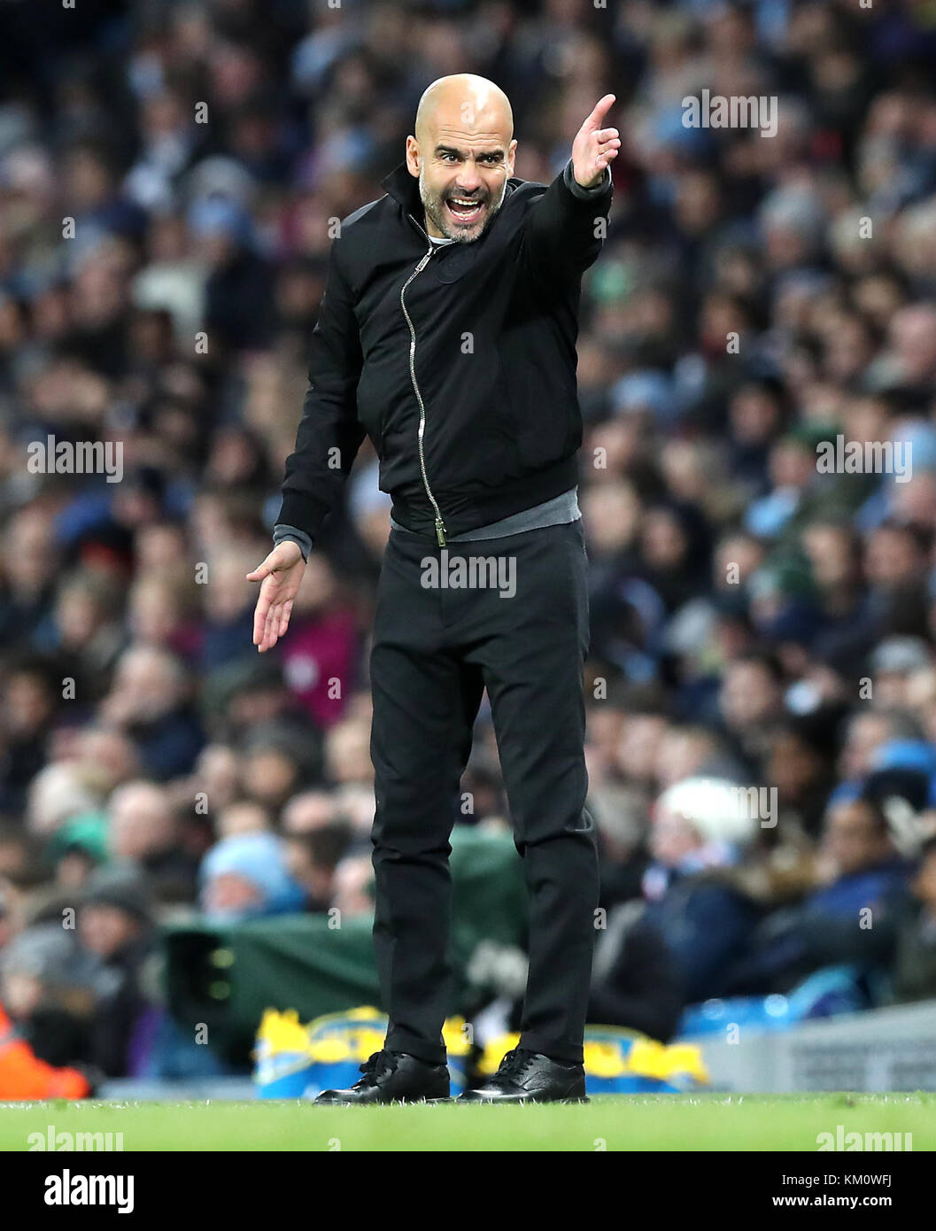 Manchester City manager Pep Guardiola gestures on the touchline during ...