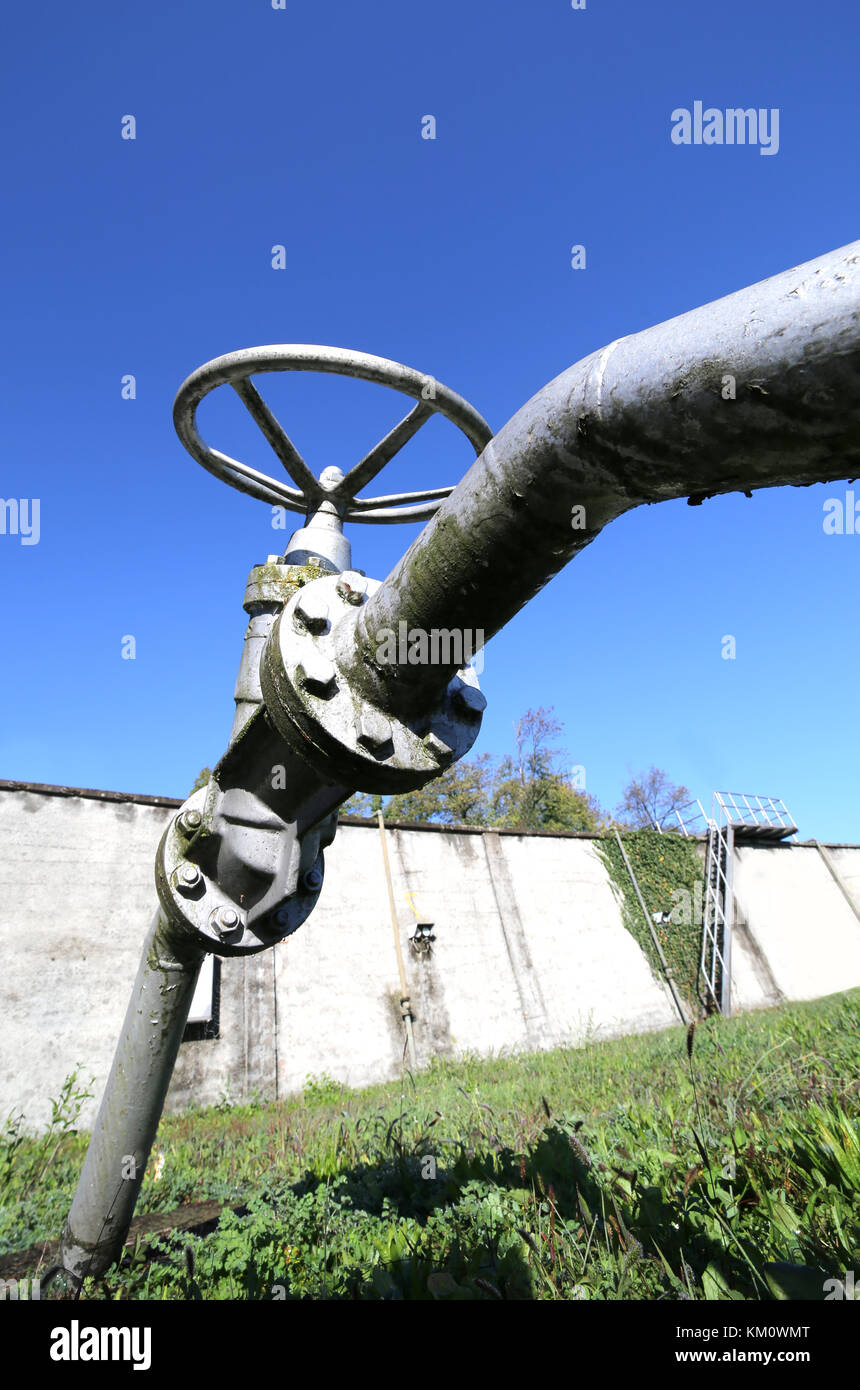 circular shut-off valve to close or open the metal tube photographed ...