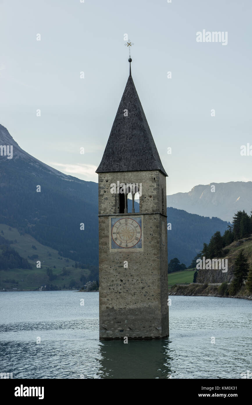 Church under water, drowned village, mountains landscape and peaks in ...