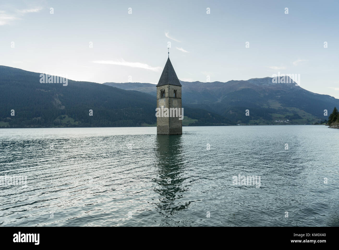 Church under water, drowned village, mountains landscape and peaks in ...