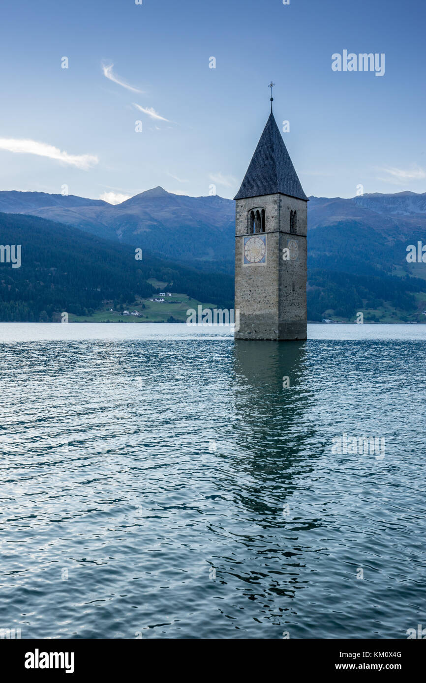 Church under water, drowned village, mountains landscape and peaks in ...