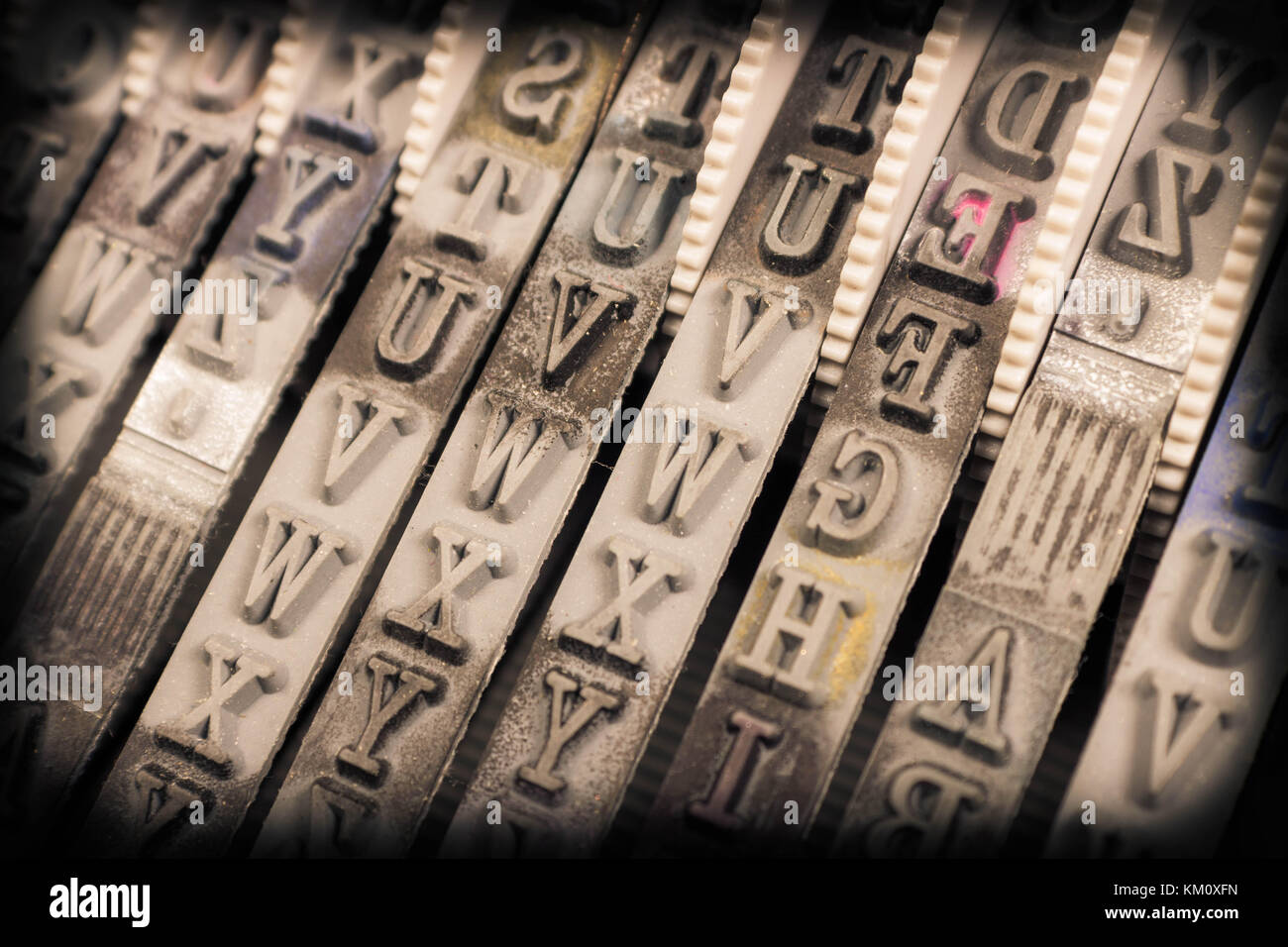 close up rubber stamp with numbers and letters Stock Photo - Alamy