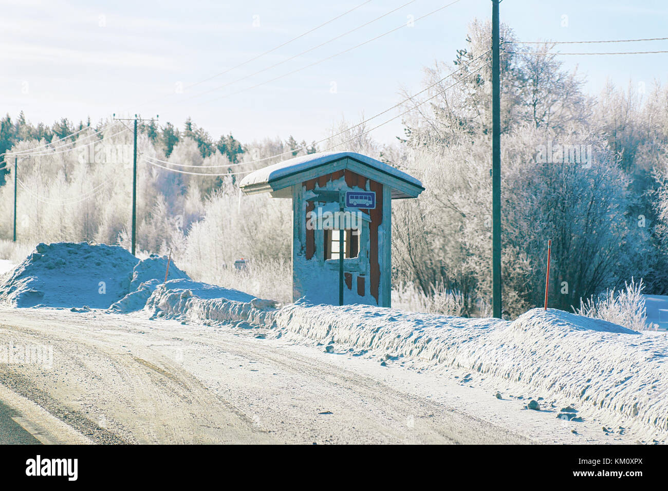 Wooden bus stop at winter countryside in Lapland, Finland Stock Photo ...
