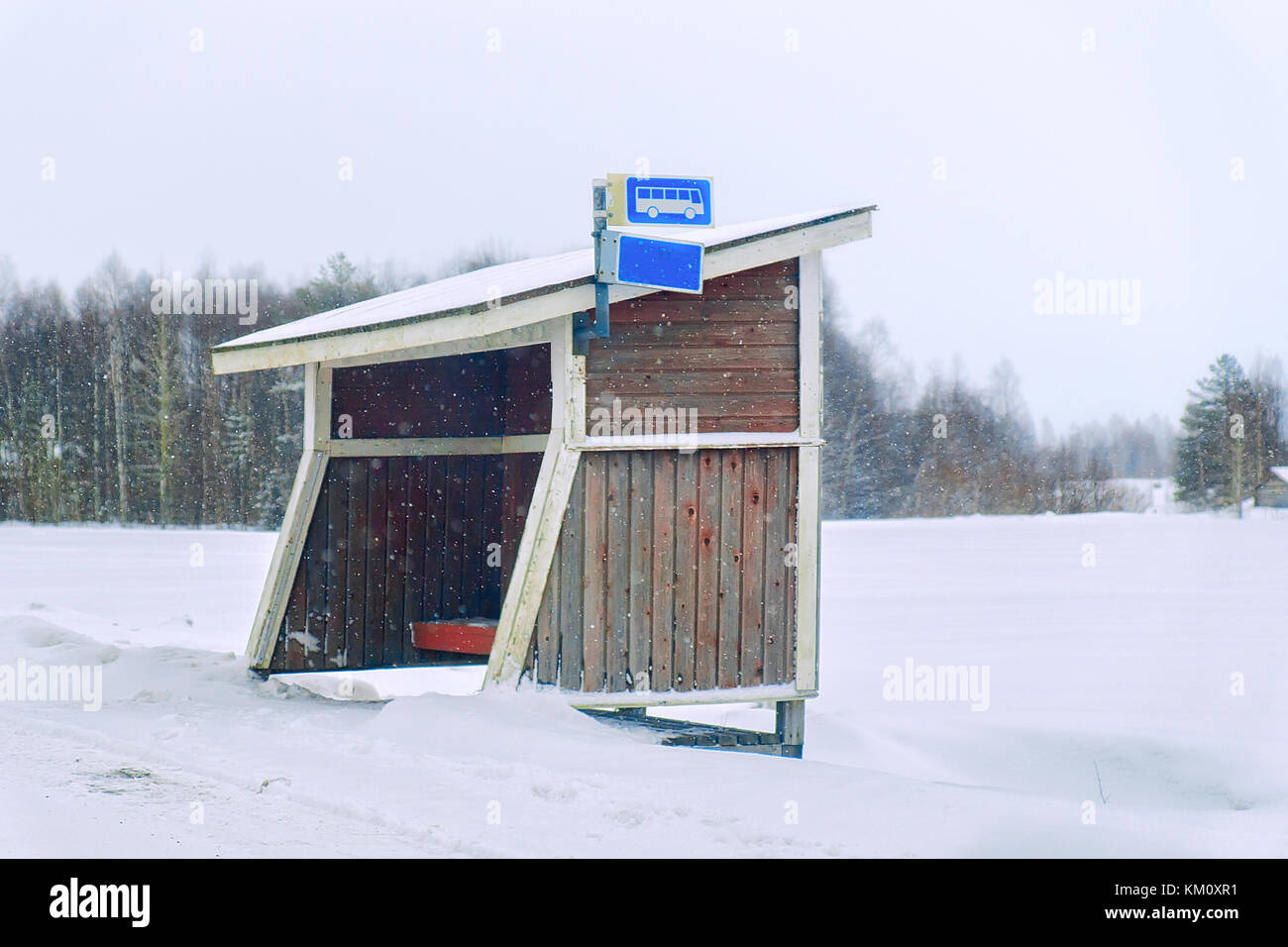 Wooden bus stop in winter countryside in Lapland, Finland Stock Photo ...