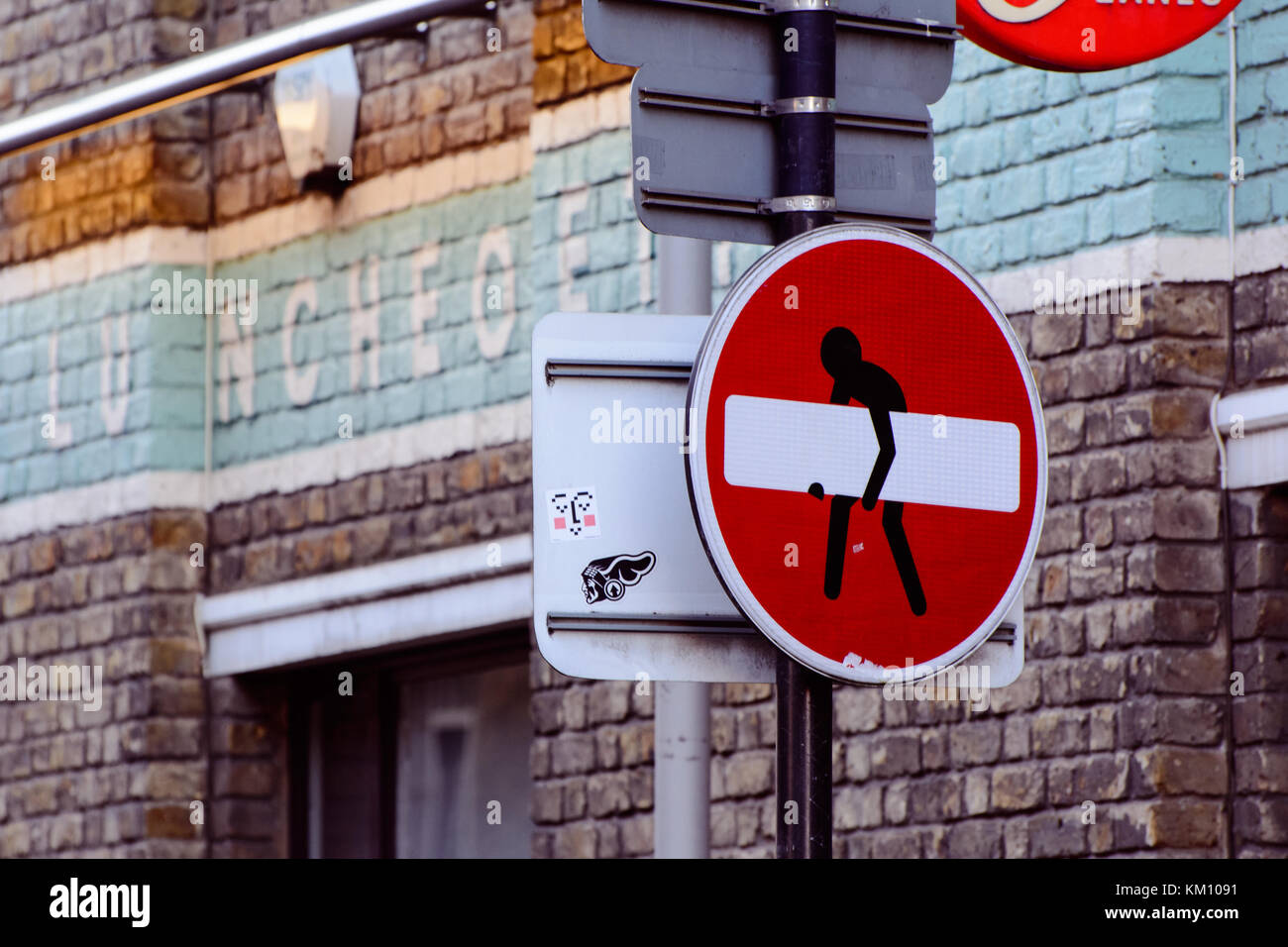 Art sticker on no entry sign in Brick Lane. London, 2016. Landscape ...