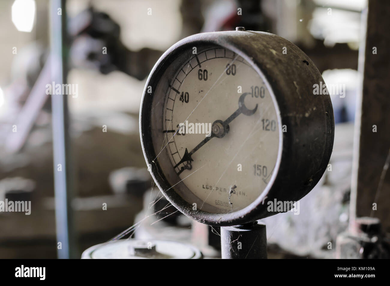 Old pressure gauge on a pump manufactured around 1940 Stock Photo - Alamy