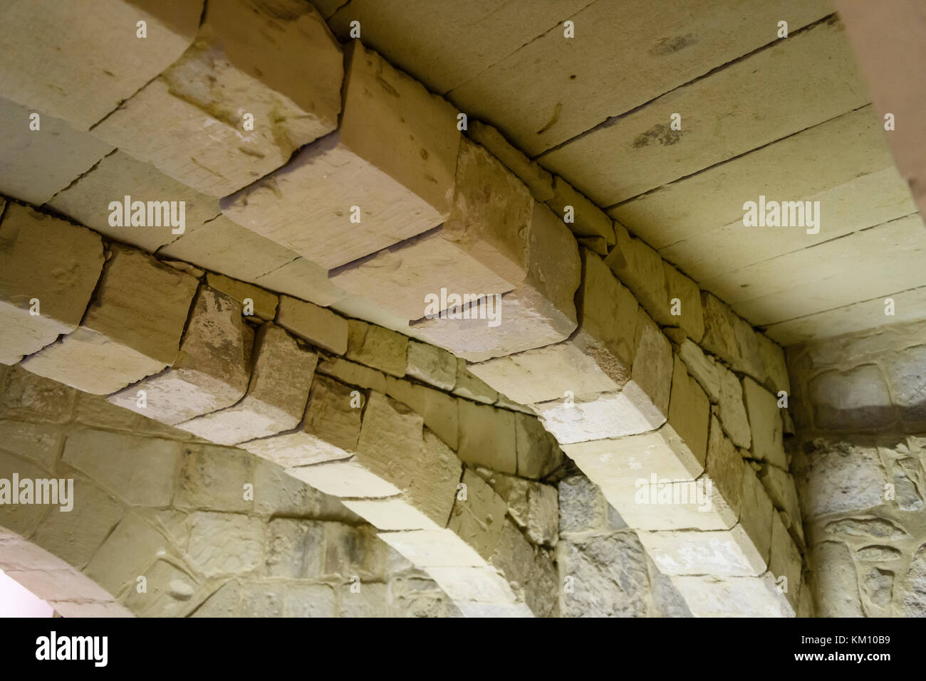 Ancient stone archways in an underground cellar Stock Photo - Alamy