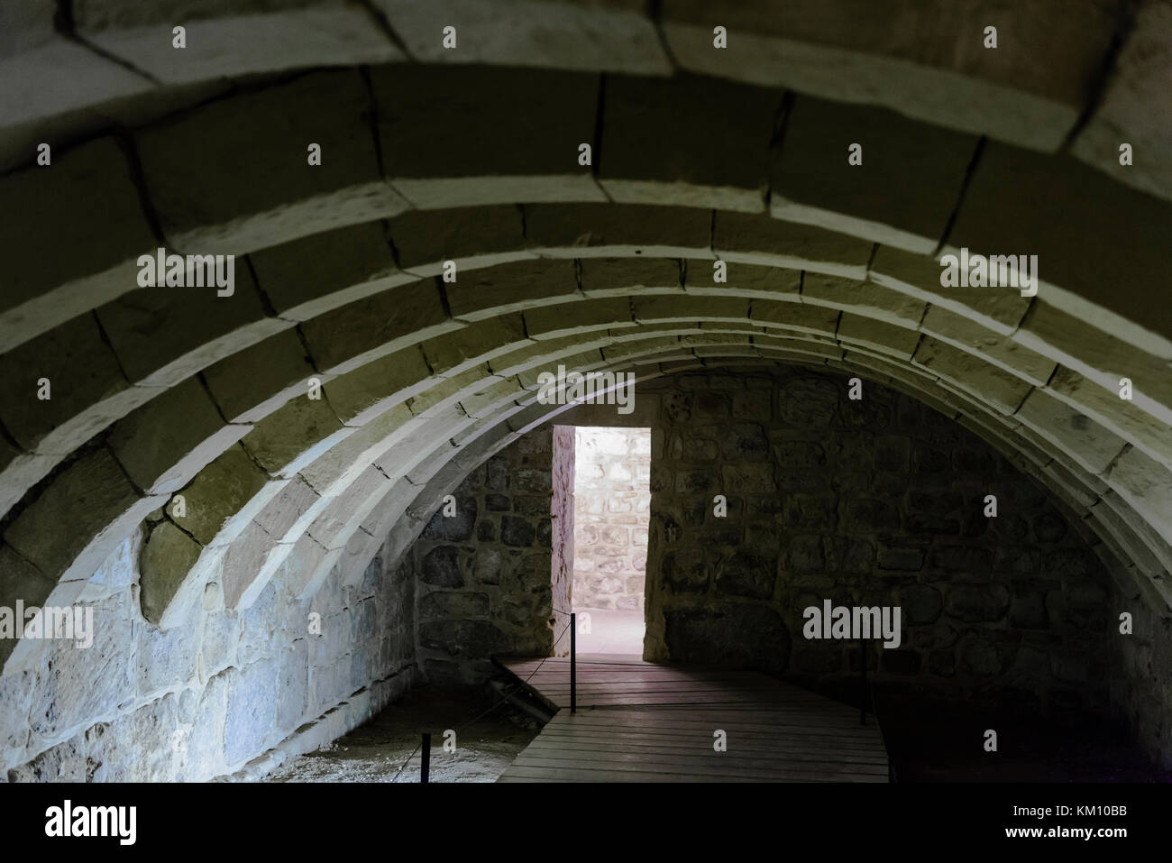 Ancient stone archways in an underground cellar Stock Photo - Alamy