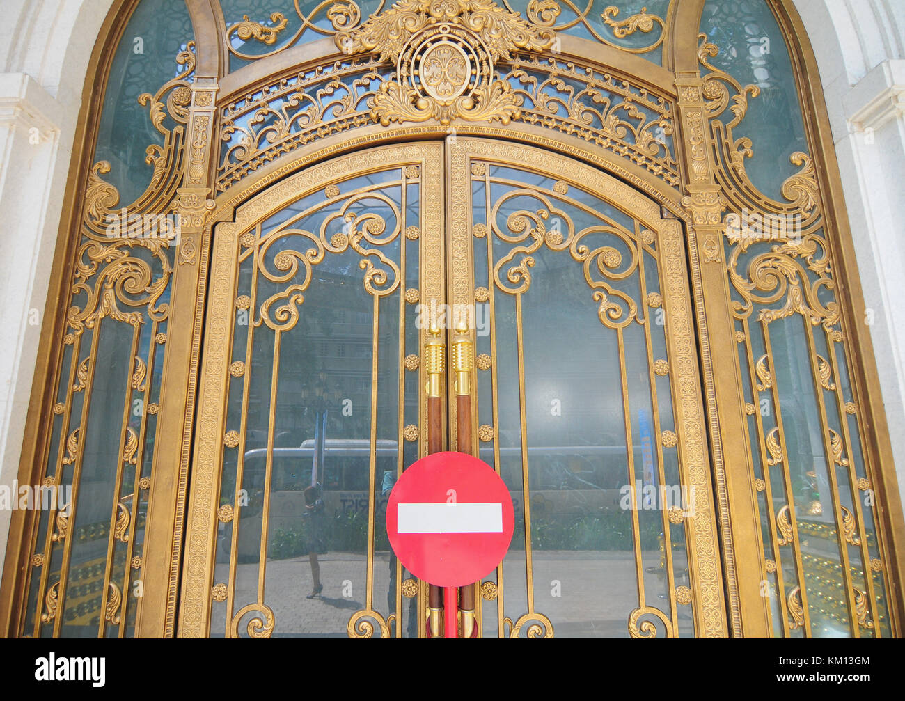 Golden ornate door with forbidden sign in Saigon, Vietnam Stock Photo ...