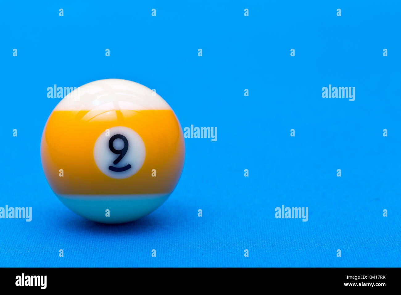 Billiard pool game nine ball on billiard table with blue cloth, copy ...