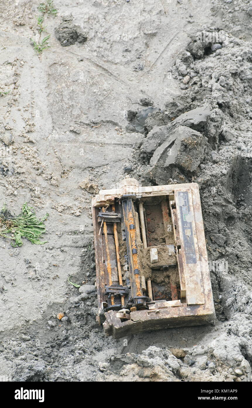 Dirty Old Broken Printer in the Mud Closeup Stock Photo - Alamy